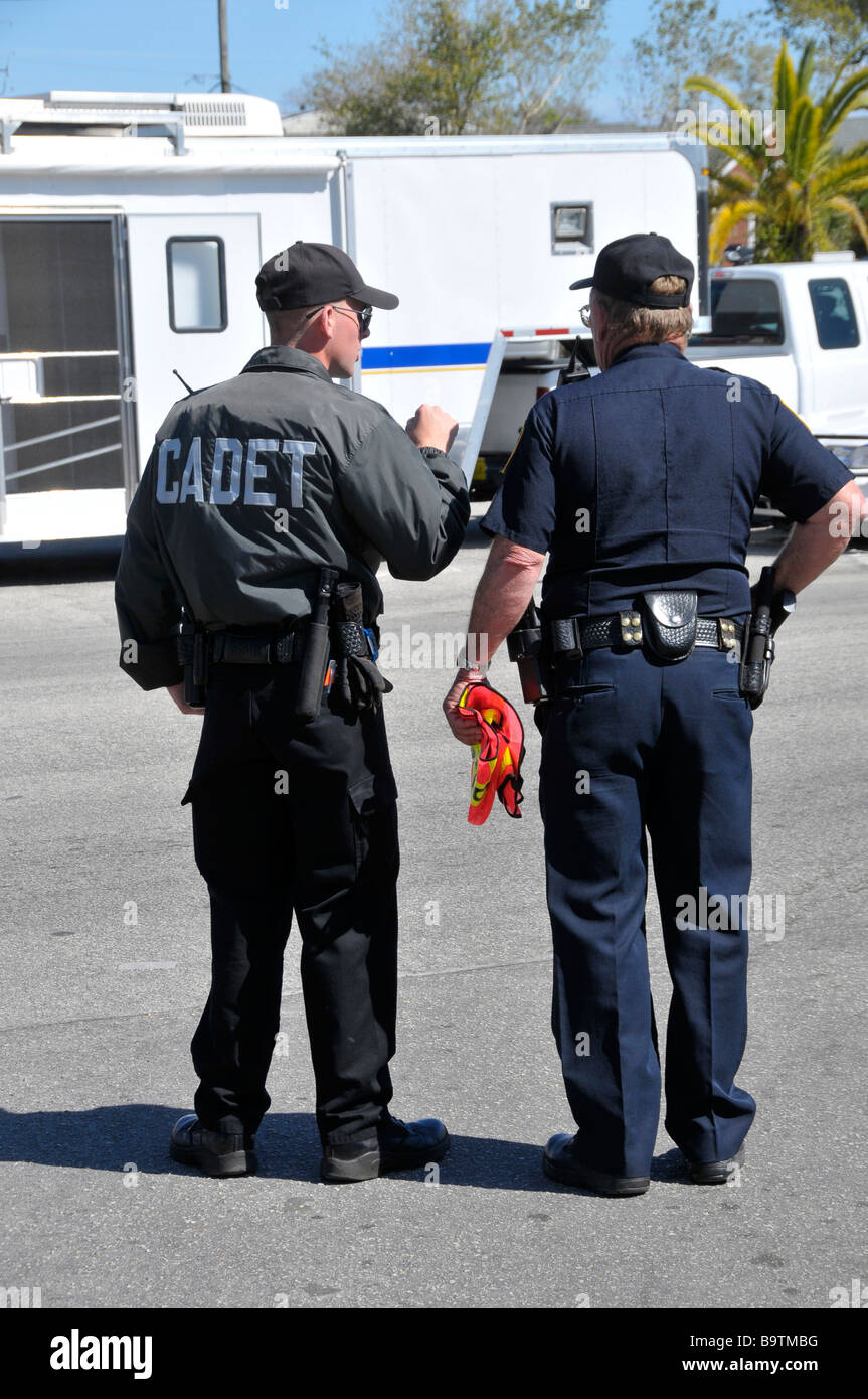 Cadet and Police Officer Manage Crowd at Lake Wales Mardi Gras ...