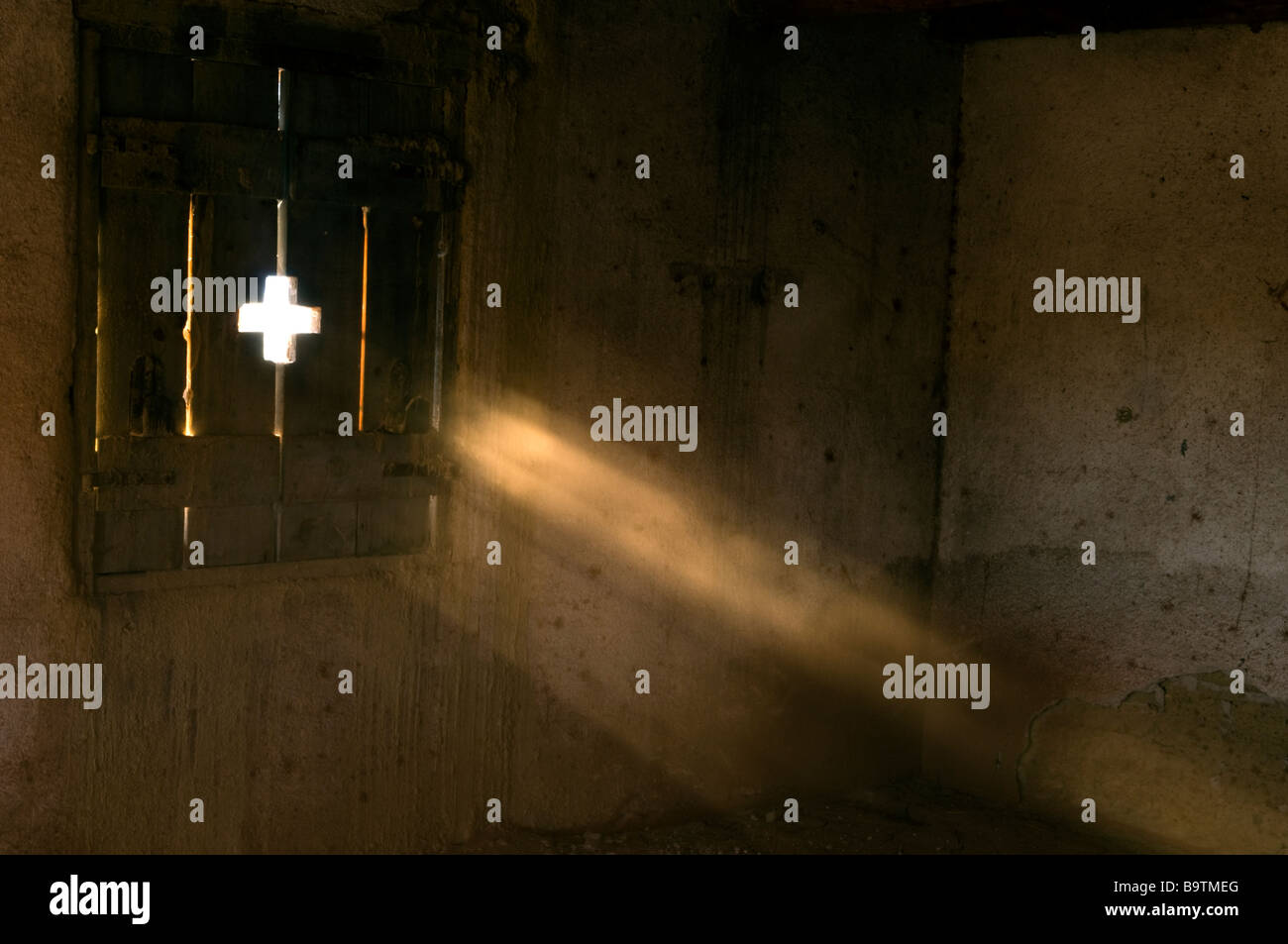 Light beam through the window of an old movie set building Stock Photo ...
