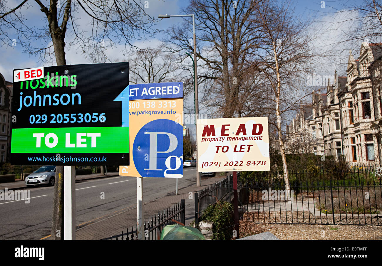 Estate agent signs for flats to let Cardiff Wales UK Stock Photo - Alamy