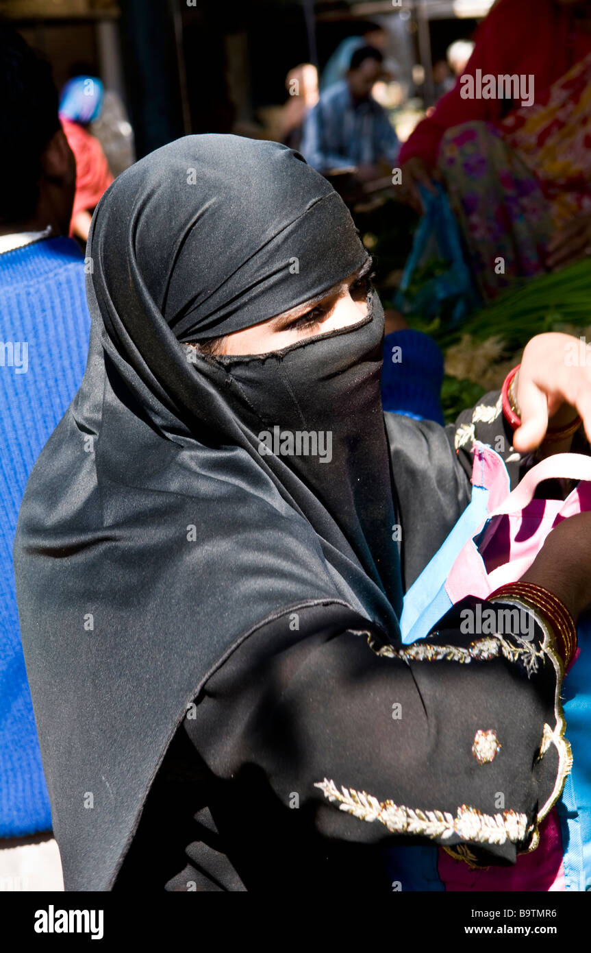 A Muslim woman wearing a Hijab and a veil Stock Photo - Alamy