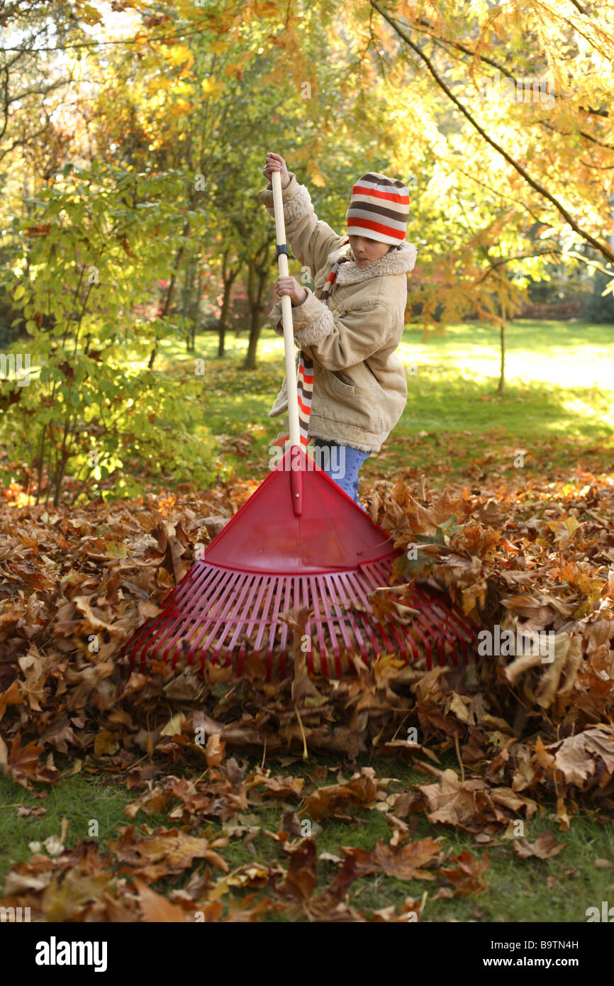 Child Raking Leaves High Resolution Stock Photography and Images - Alamy