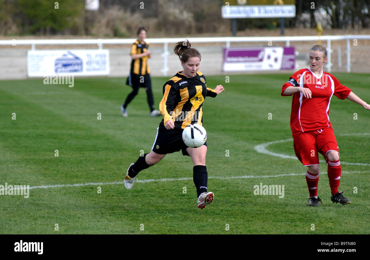 Girls playing football match uk hi-res stock photography and images - Alamy