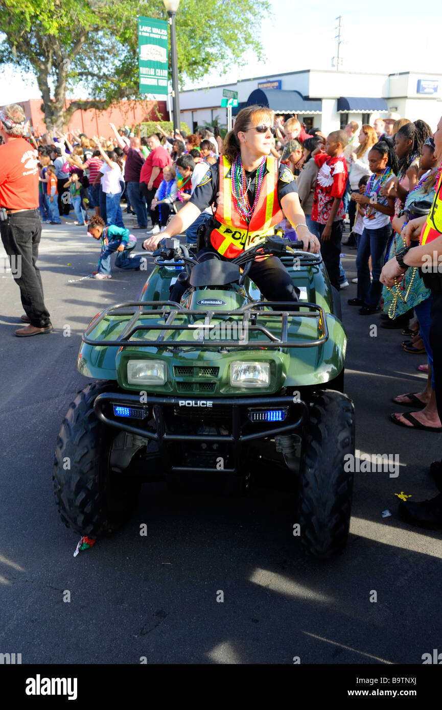 White Female Police Officer Rides Gator Vehicle Through Crowd at Lake ...