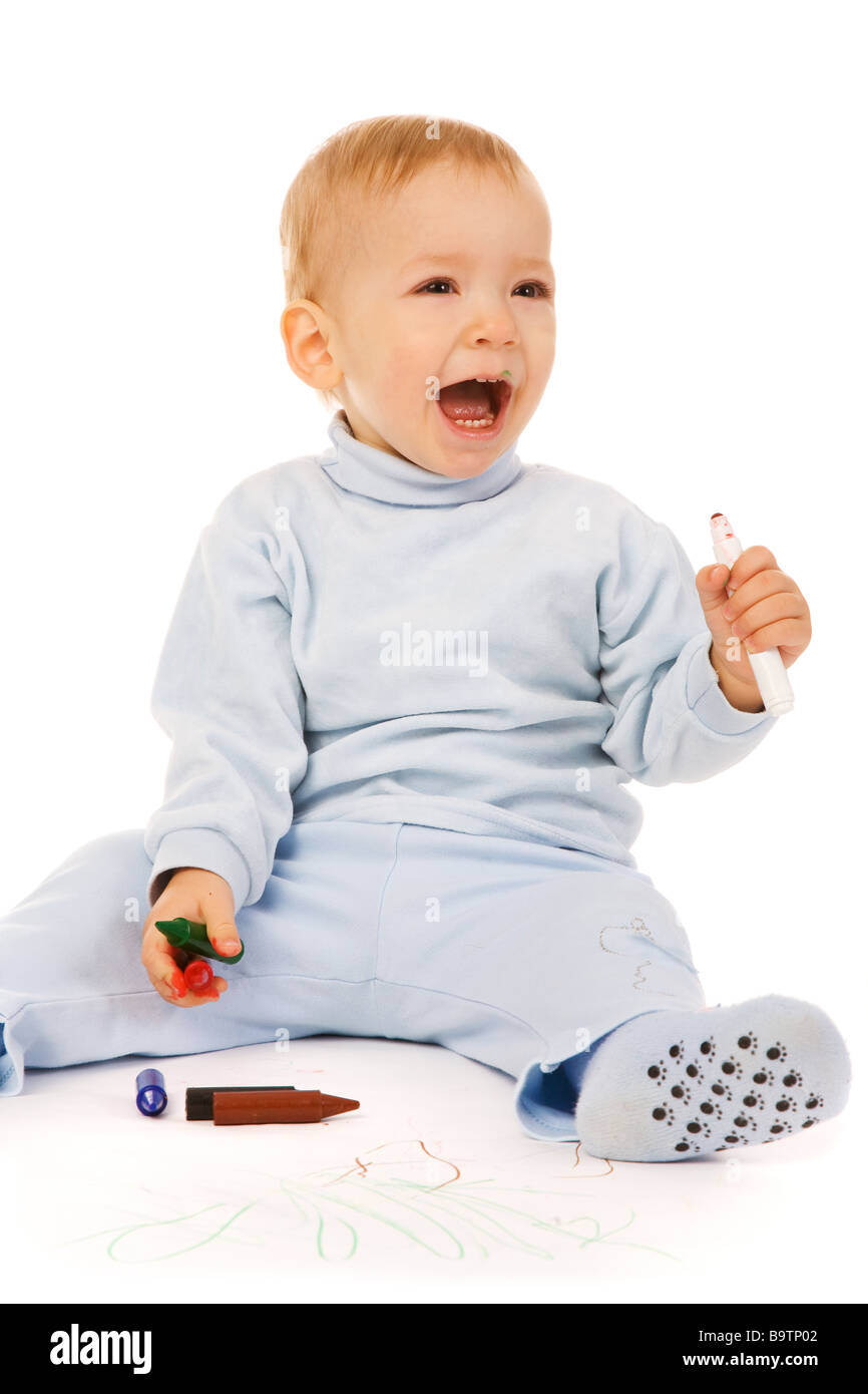 emotional boy with color crayon on white background Stock Photo - Alamy