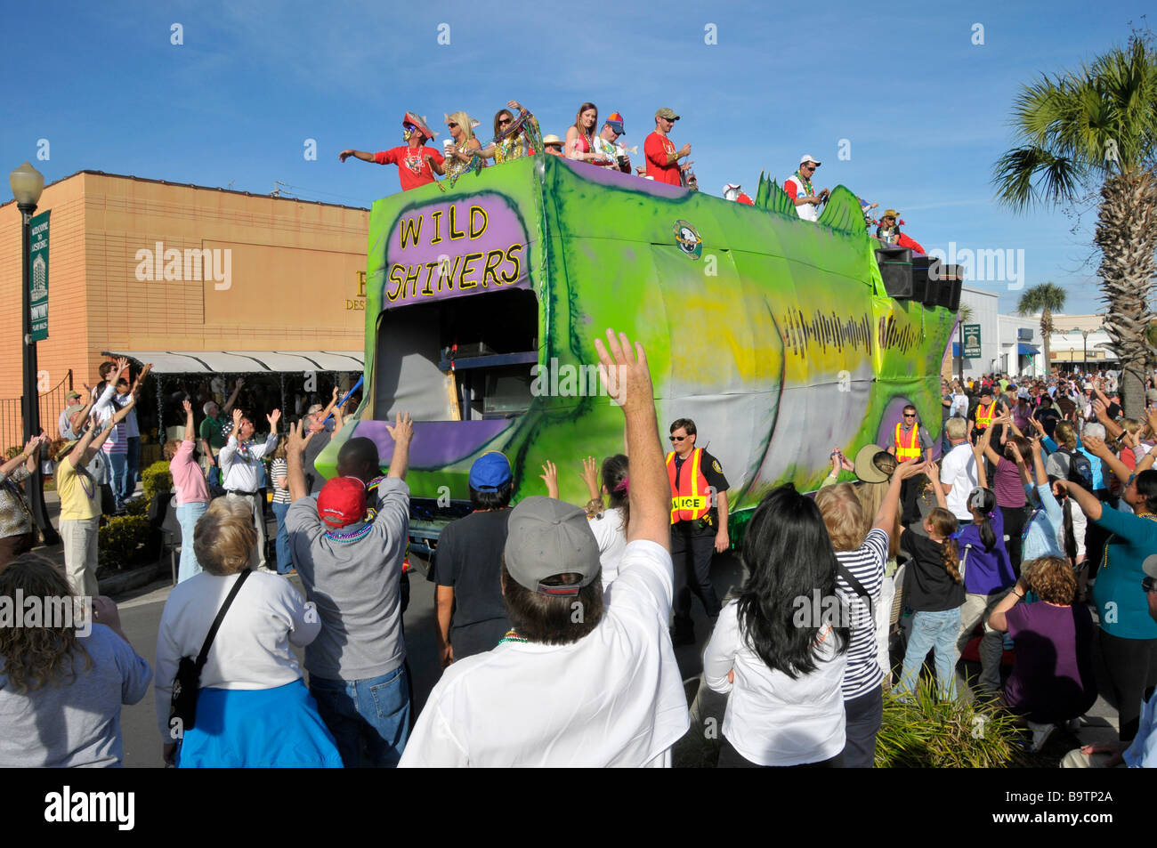 Crowd Waves at Float in Lake Wales Mardi Gras Parade Central Florida ...