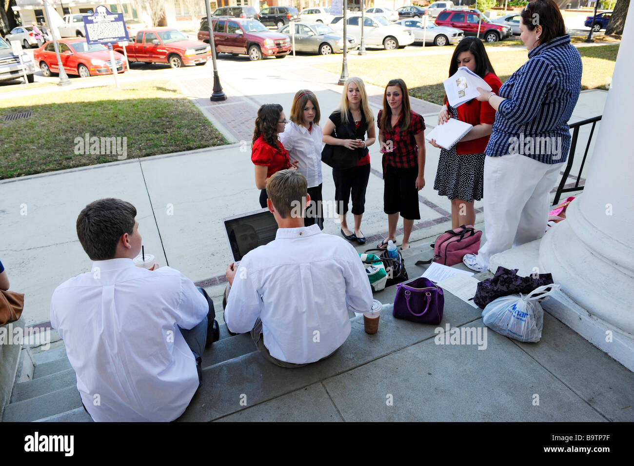 Students on field trip work on laptop computers Stock Photo - Alamy