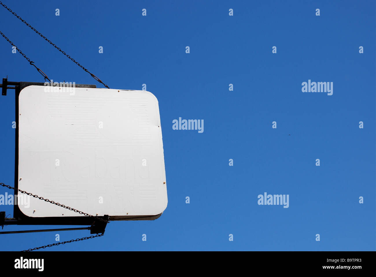 Blank Store Sign against blue sky Stock Photo - Alamy