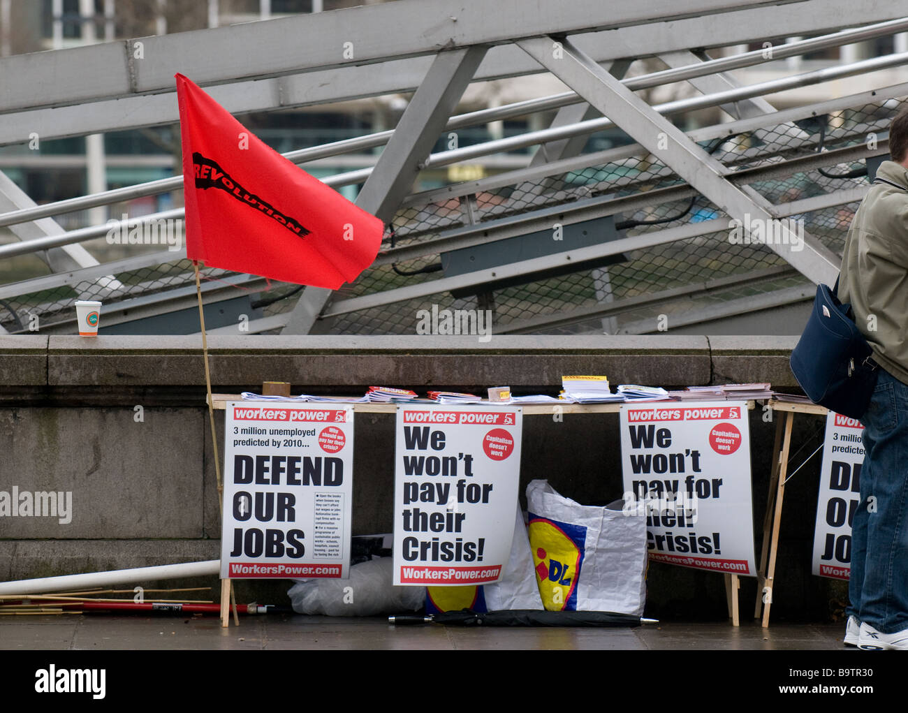 A flag and posters at a peace demonstration Stock Photo - Alamy