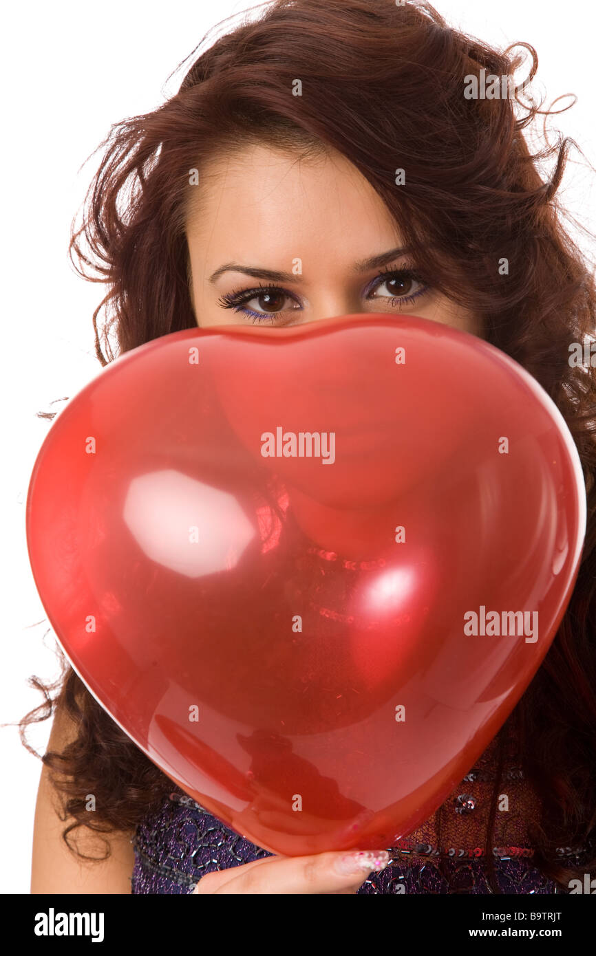 pretty woman with red balloon on white background Stock Photo - Alamy