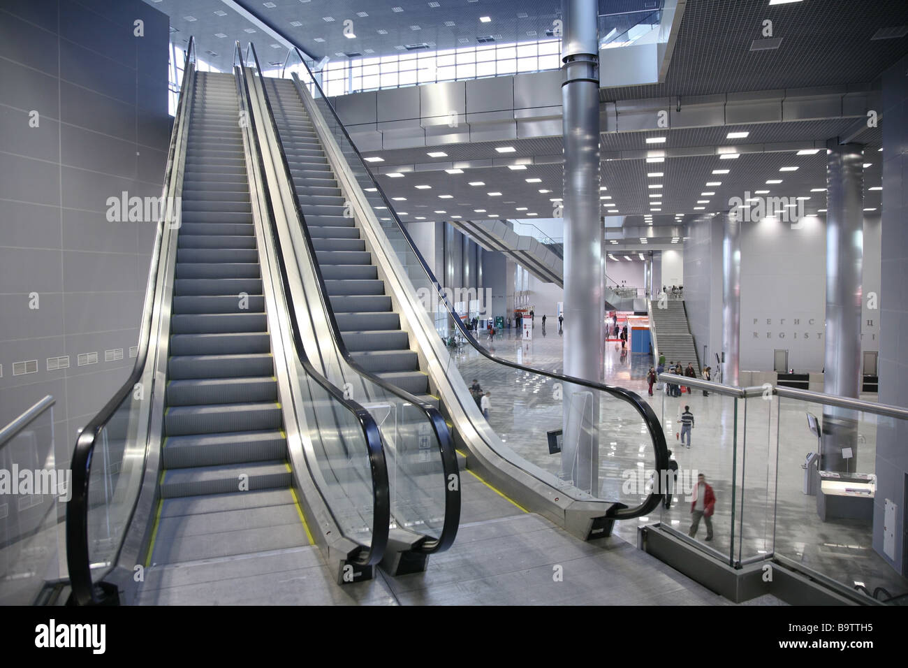 escalator in the business center Stock Photo - Alamy