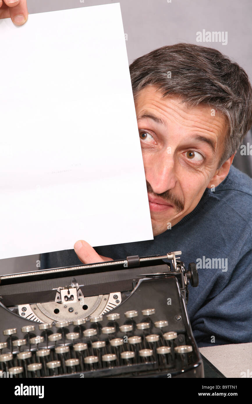 Man show blank white sheet Stock Photo - Alamy