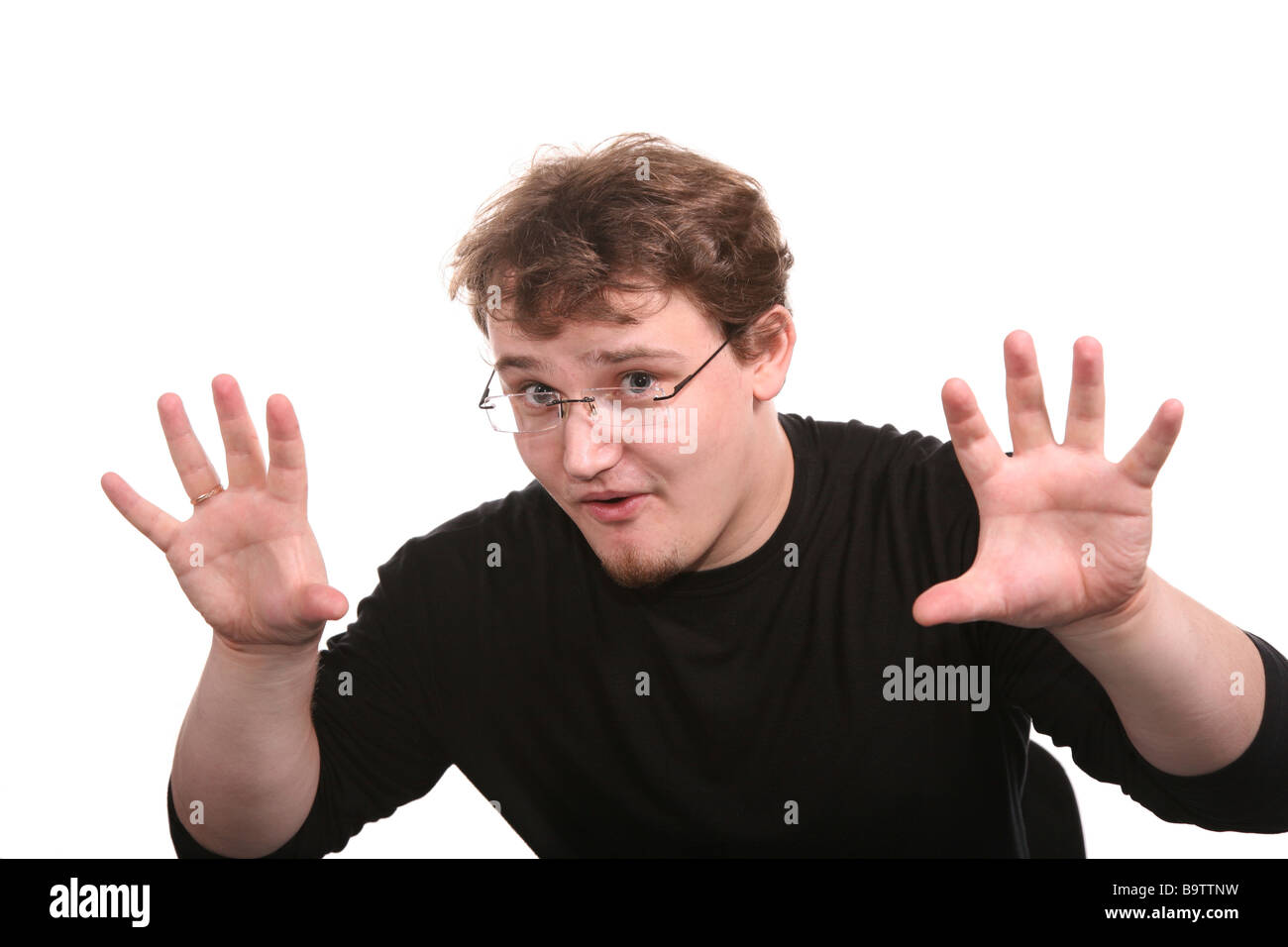 young man shows gestures by the hands Stock Photo - Alamy