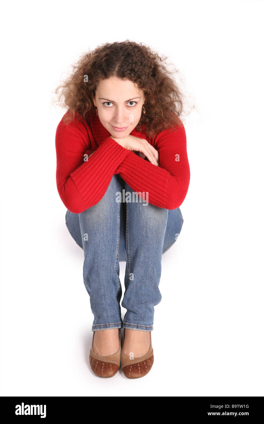 beautiful young woman seated isolated on white Stock Photo - Alamy
