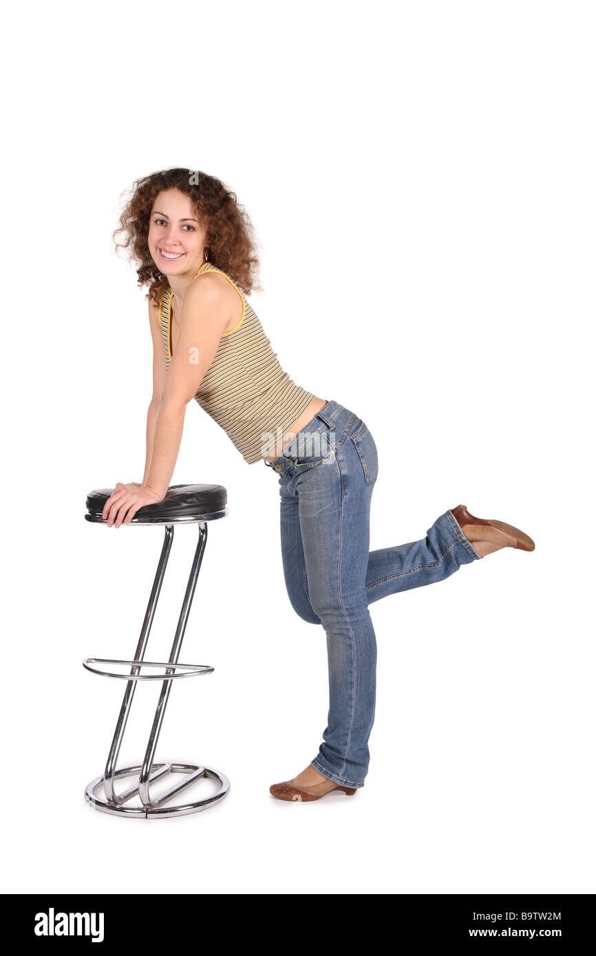 young woman and bar stool isolated on white Stock Photo - Alamy