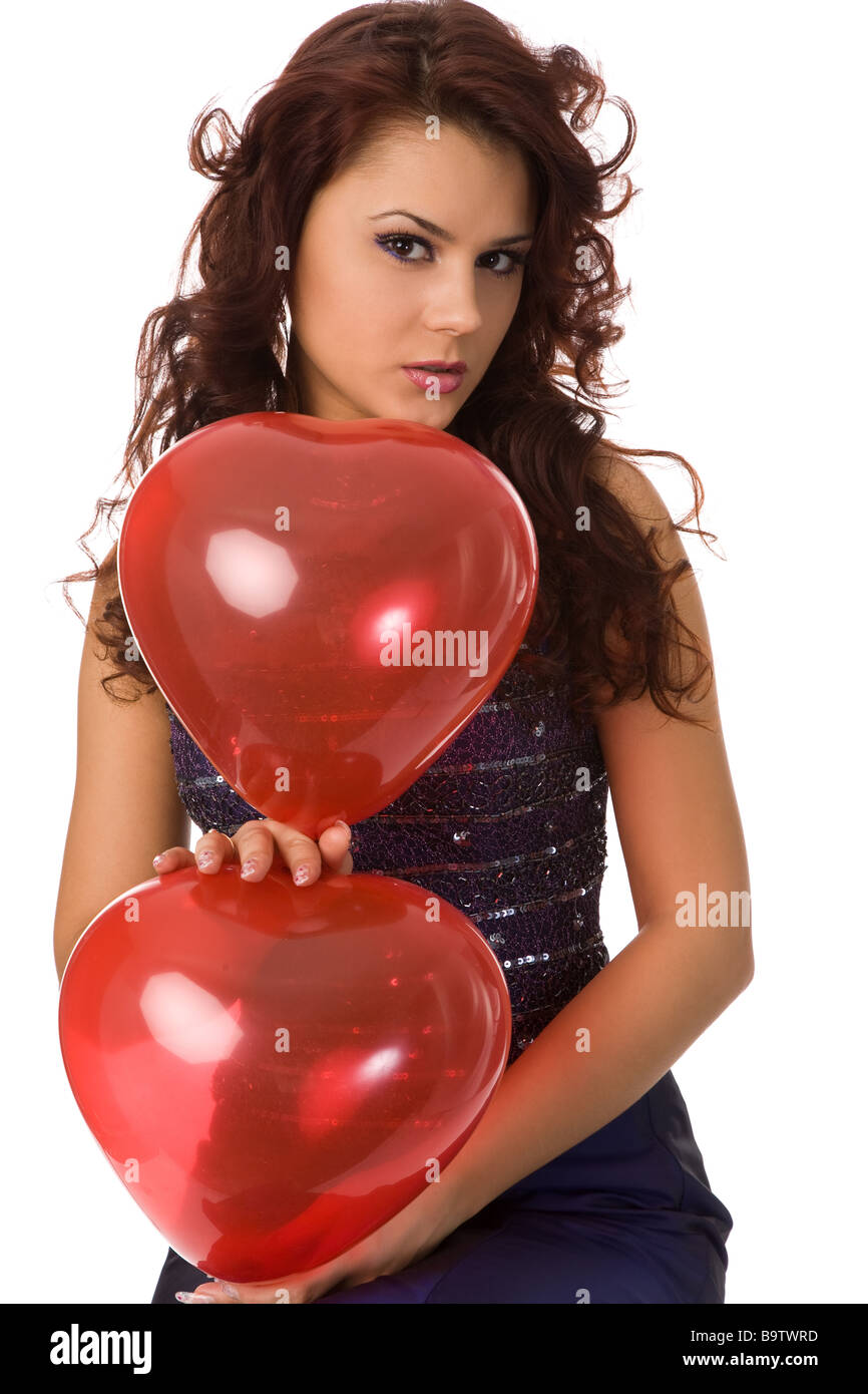 pretty woman with red balloon on white background Stock Photo - Alamy