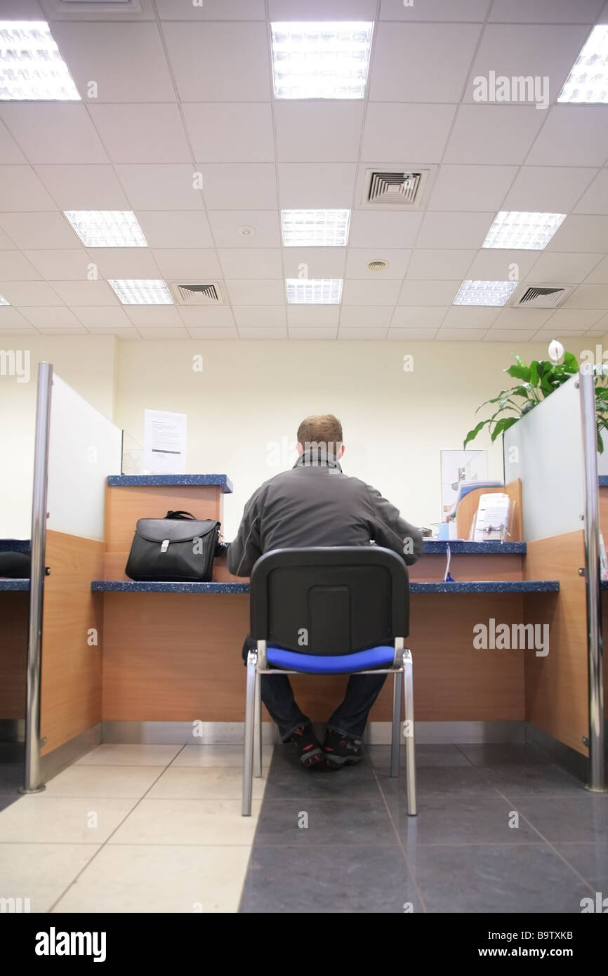 man in bank office Stock Photo - Alamy