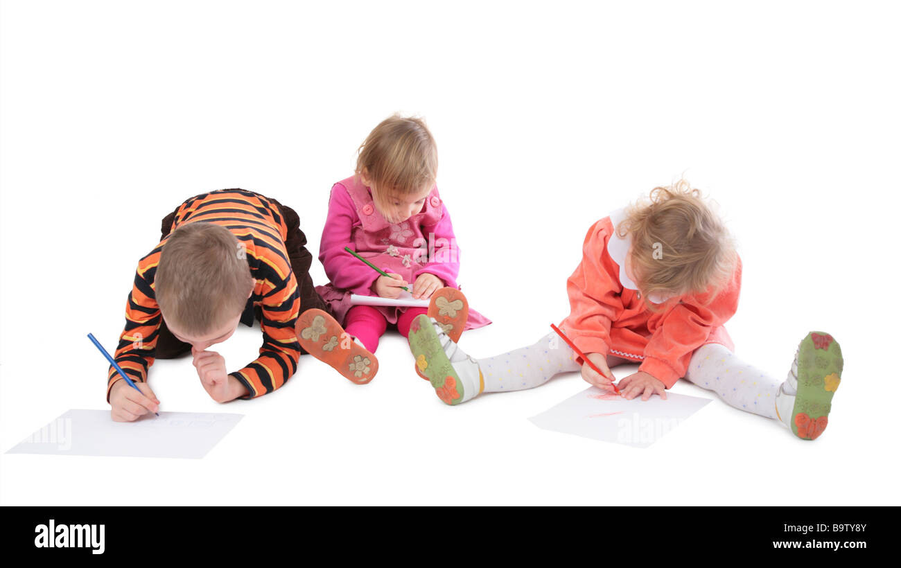 Three children drawing 3 Stock Photo - Alamy