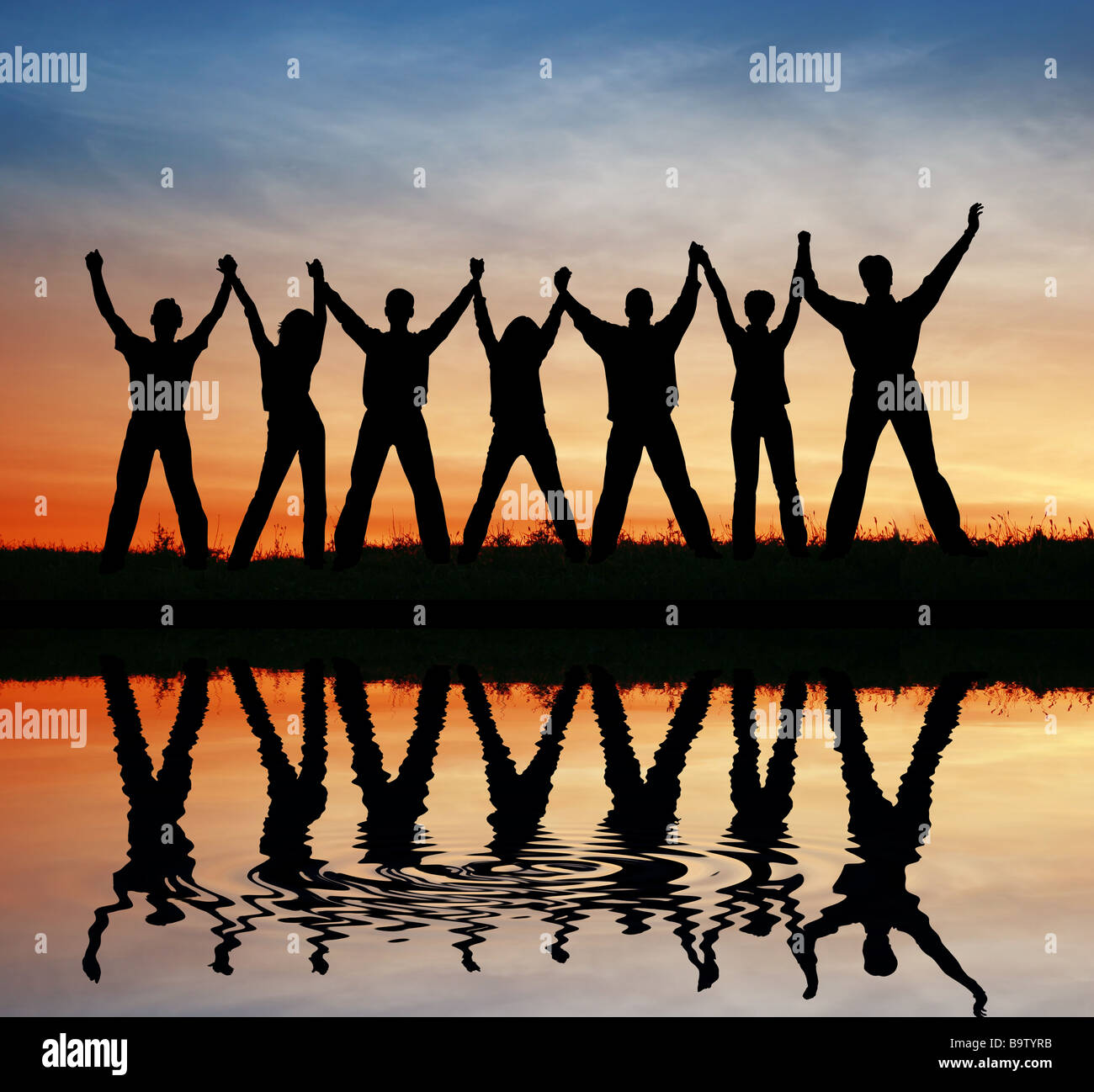 silhouette friends. sunset water Stock Photo - Alamy