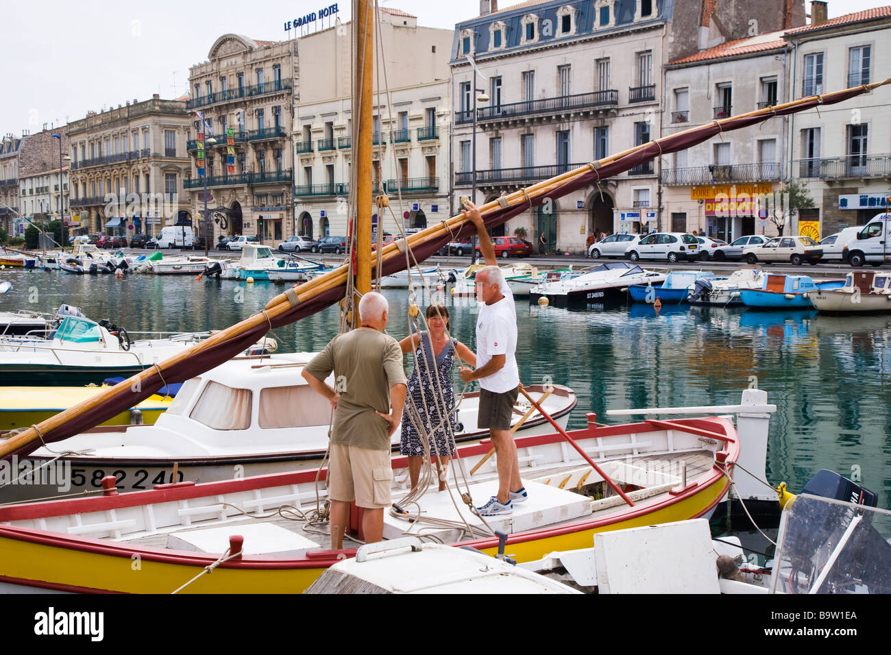 Preparing a boat for sailing Canal Royal Sete Languedoc Roussillon ...