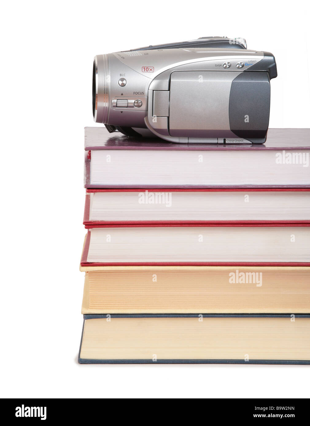 Video camera on books Stock Photo - Alamy
