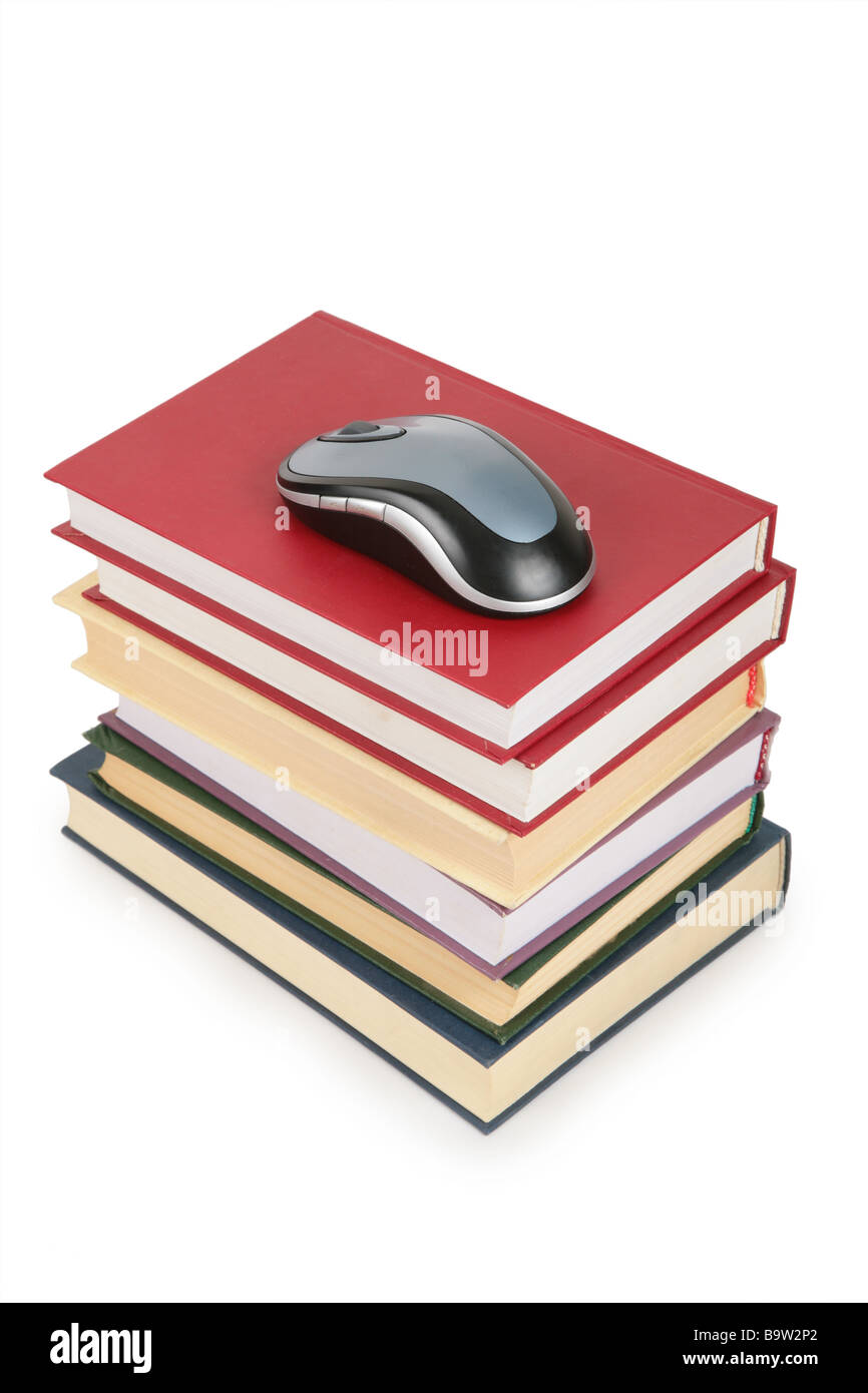 Stack books computer mouse Cut Out Stock Images & Pictures - Alamy