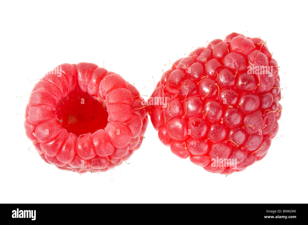 two large raspberry isolated on white background Stock Photo - Alamy