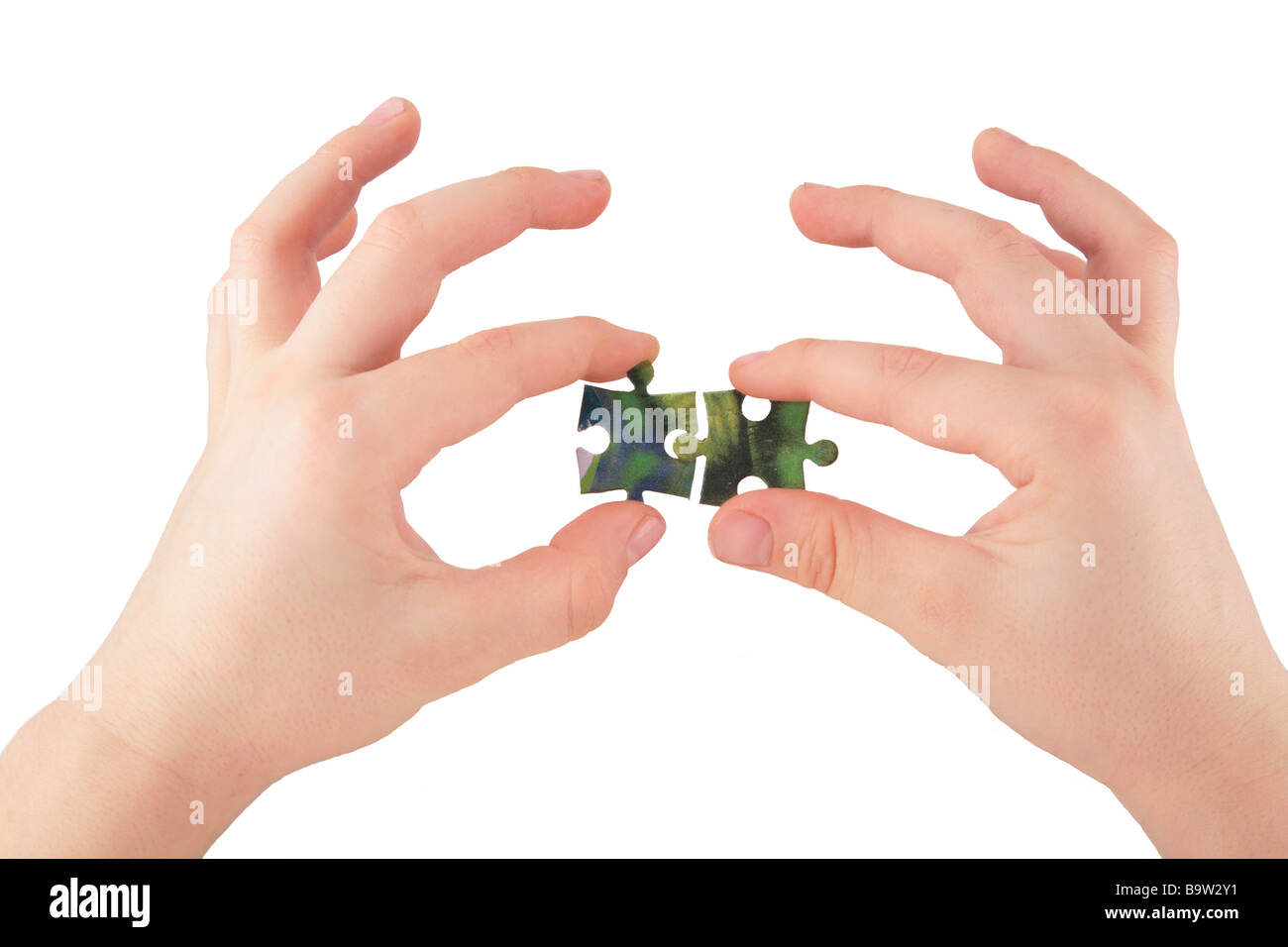 two hands with puzzle Stock Photo - Alamy