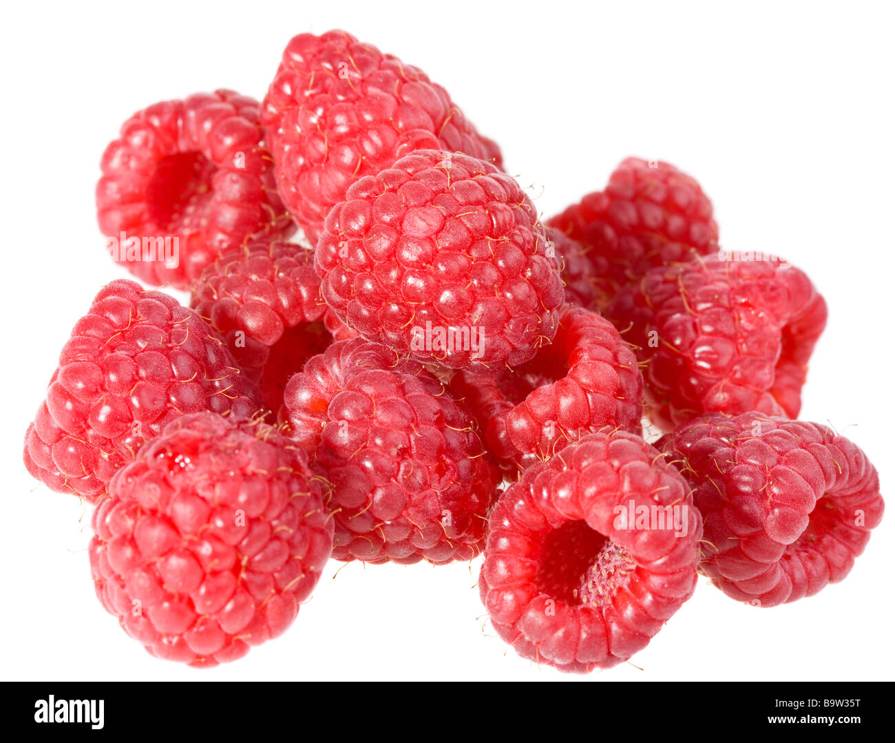 pile of raspberries isolated on white background Stock Photo - Alamy