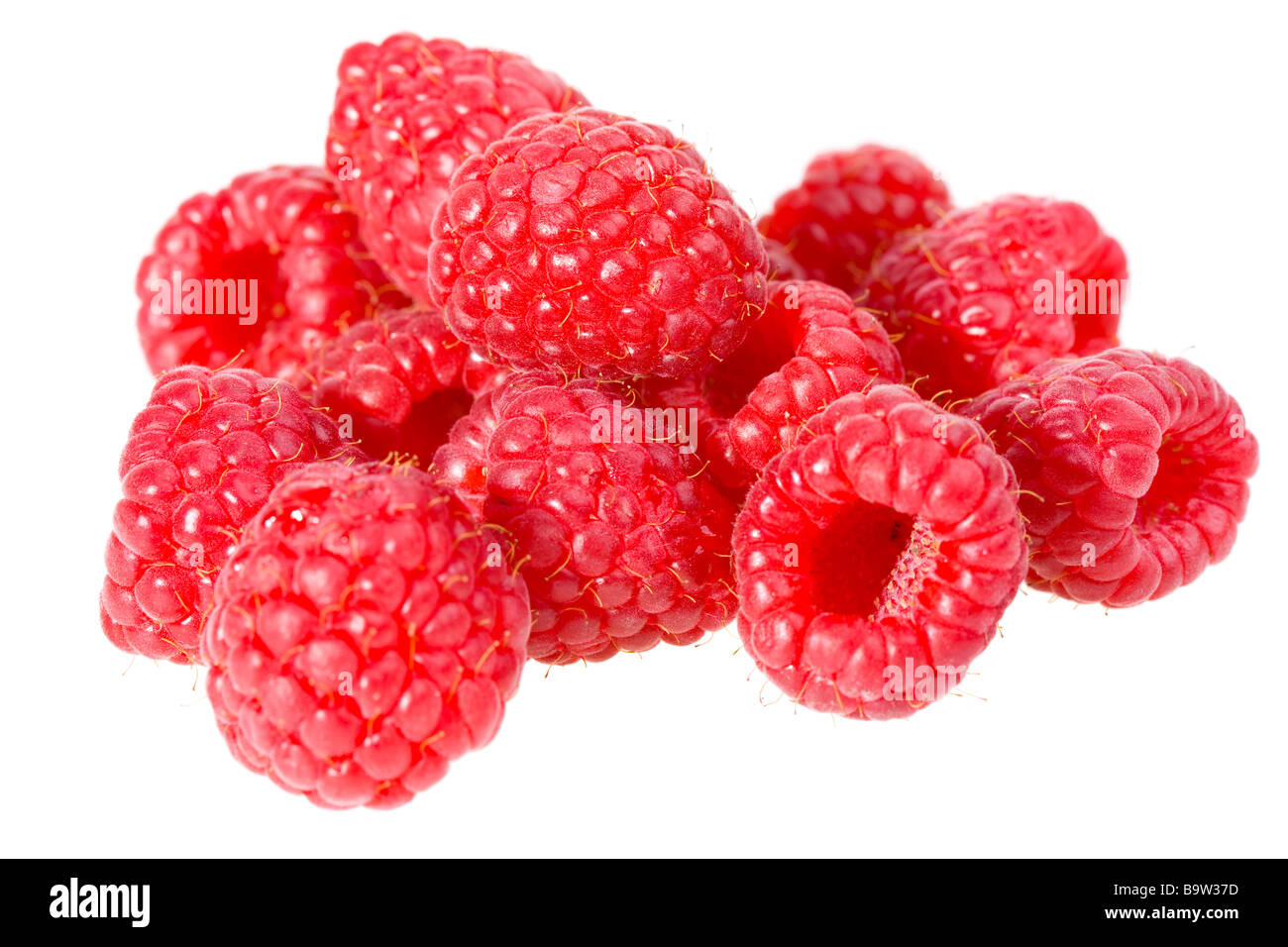pile of raspberry isolated on white background Stock Photo - Alamy