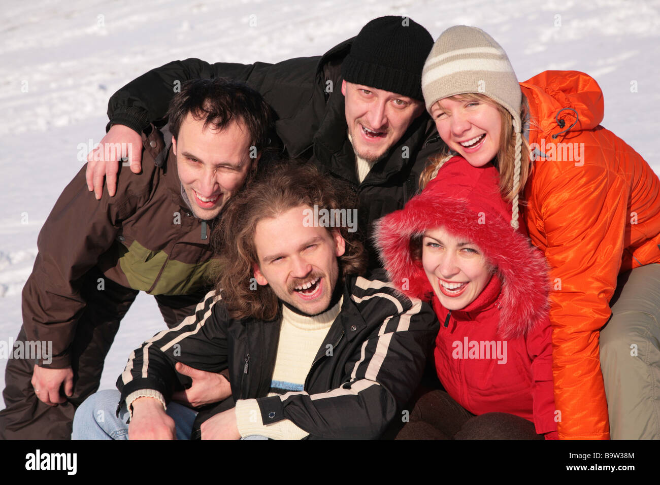 friends on winter snow Stock Photo - Alamy