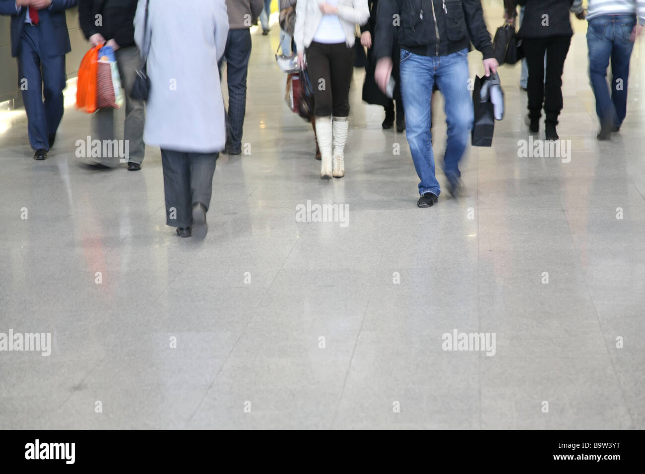 Pedestrians walking on pavement hi-res stock photography and images - Alamy