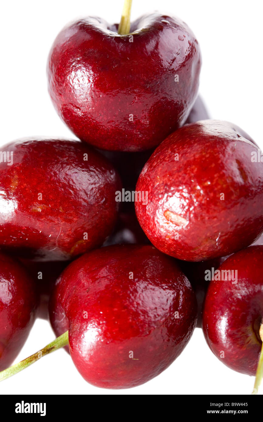 heap of cherry isolated on white background Stock Photo - Alamy