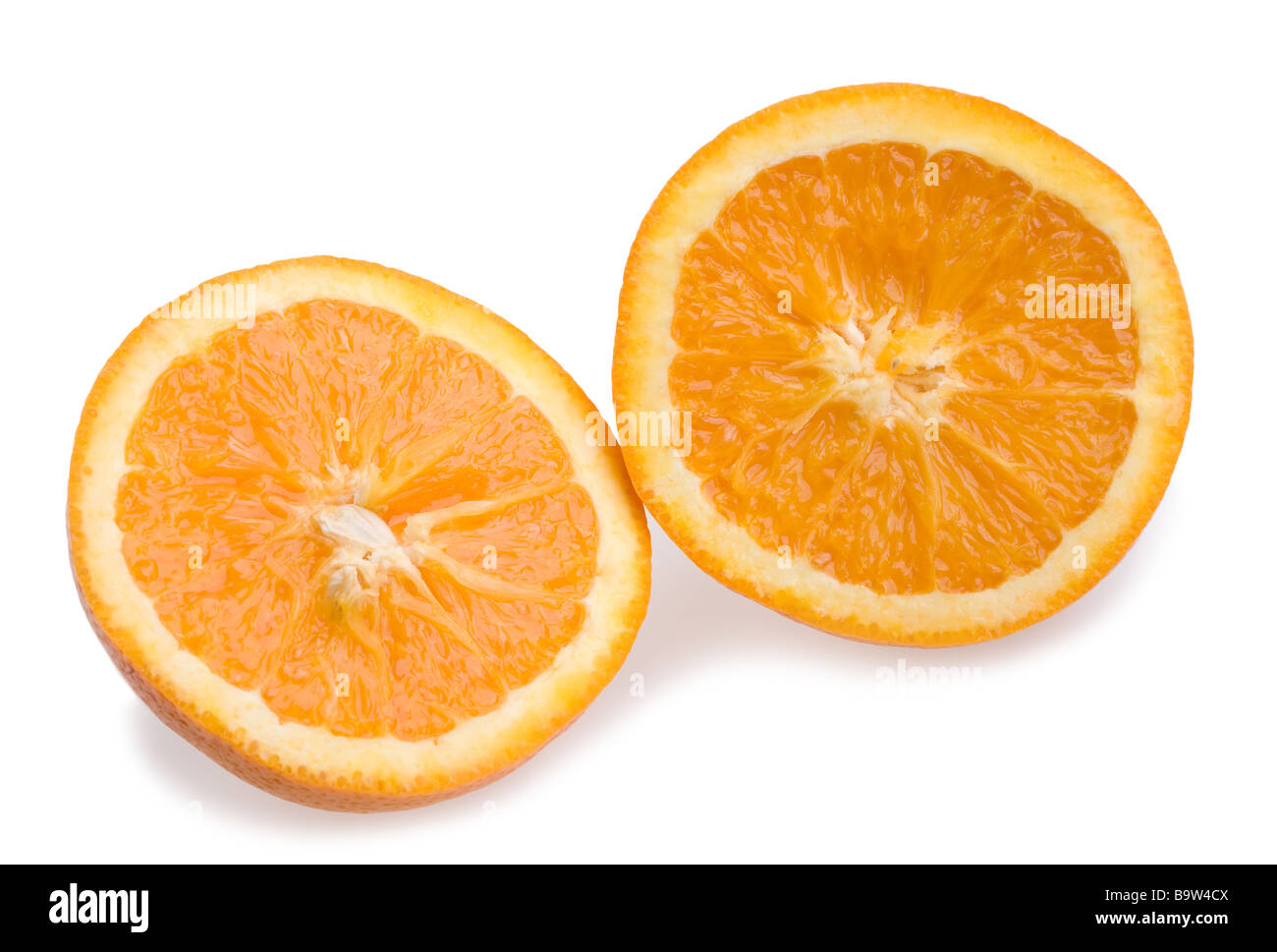 two halves of orange isolated on white background Stock Photo - Alamy