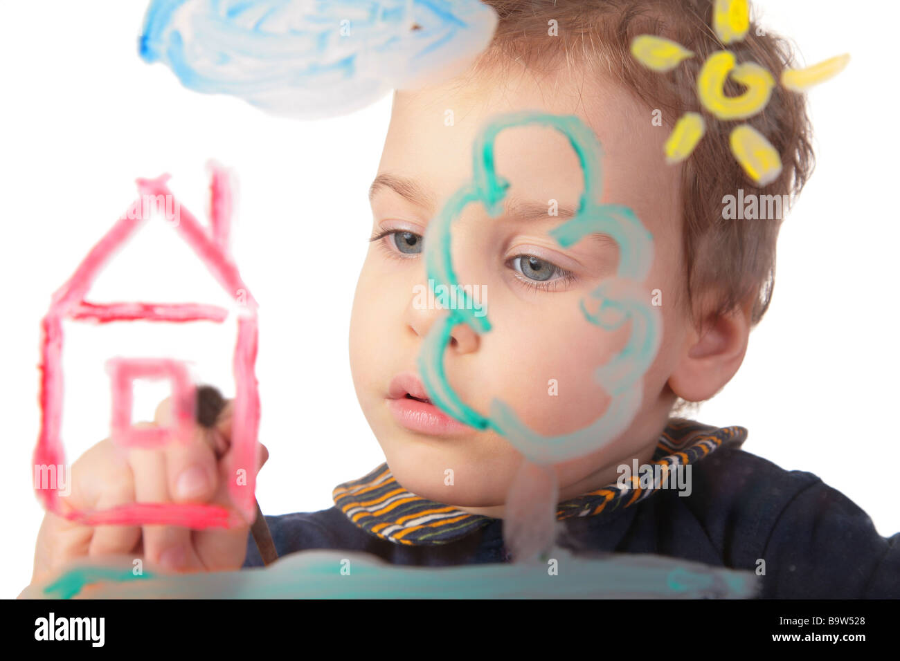 girl paints house on glass Stock Photo - Alamy