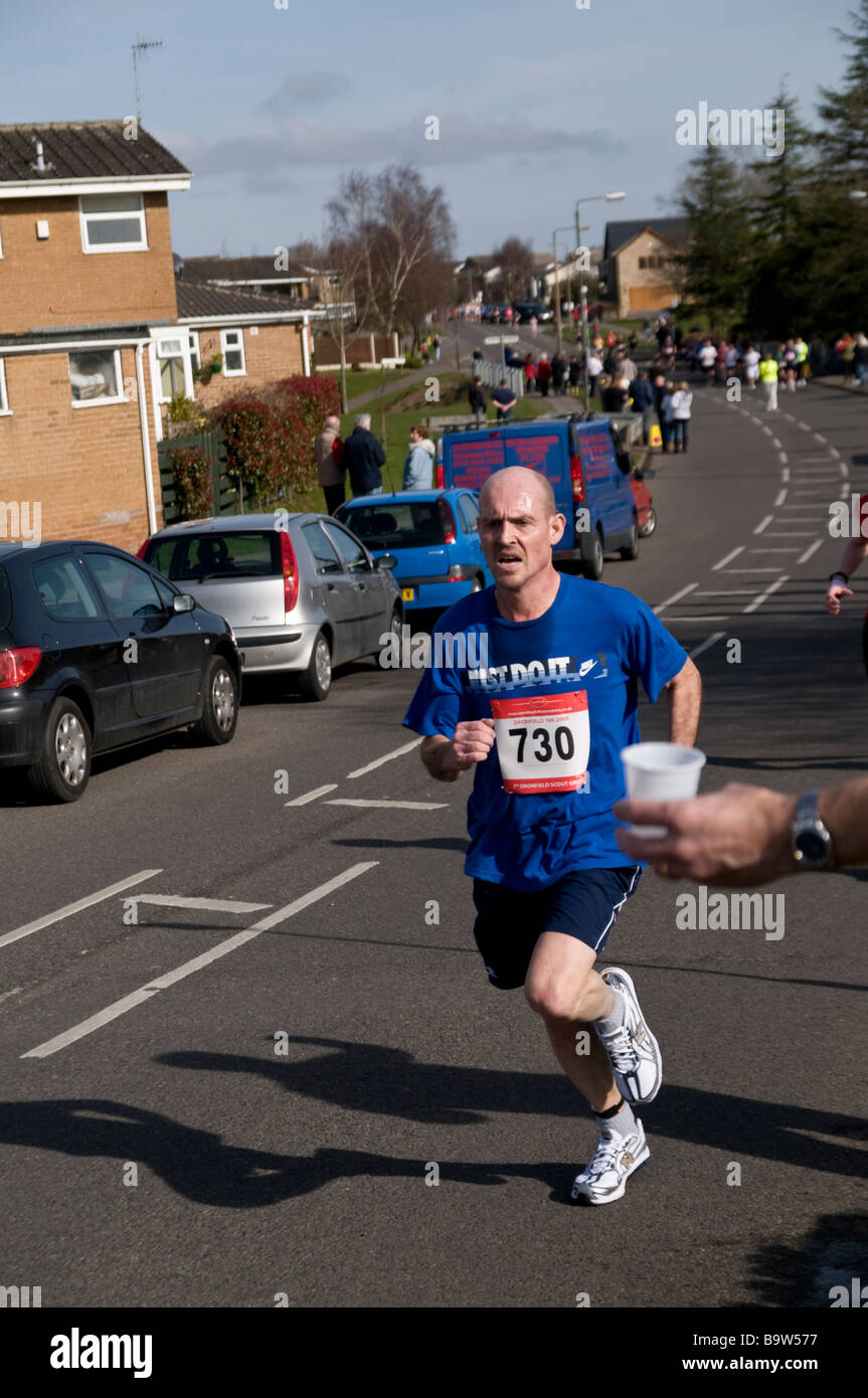 Long Distance runner competing in the Dronfield 10K fun run Derbyshire ...