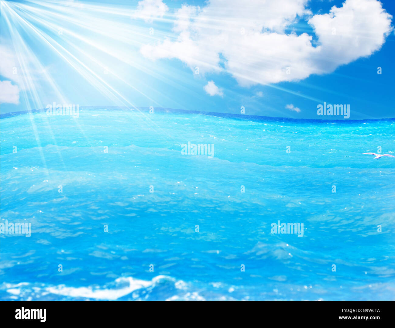 Blue sky over water Stock Photo - Alamy