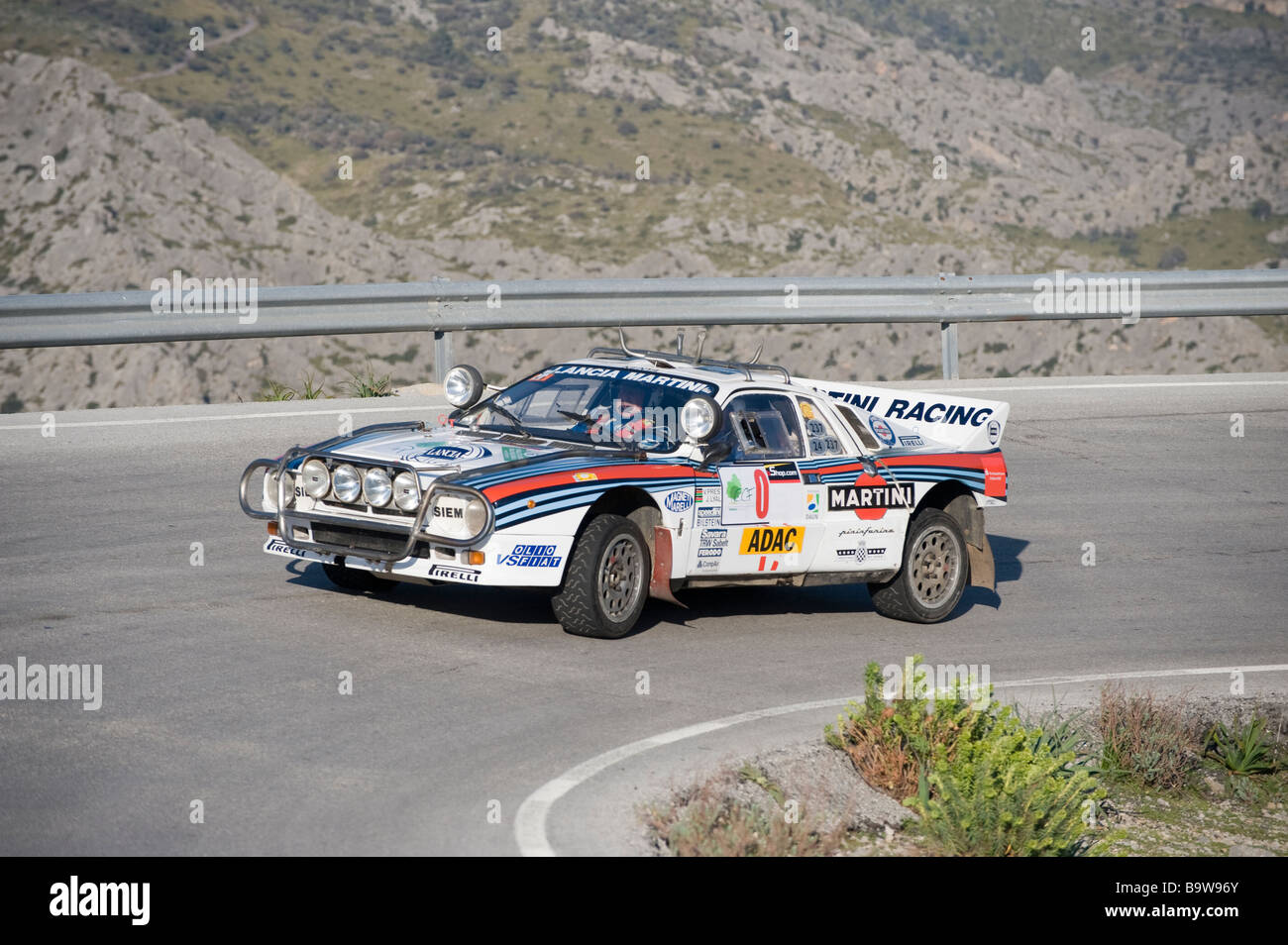 White 1983 Lancia 037 car racing in the classic car rally Mallorca ...
