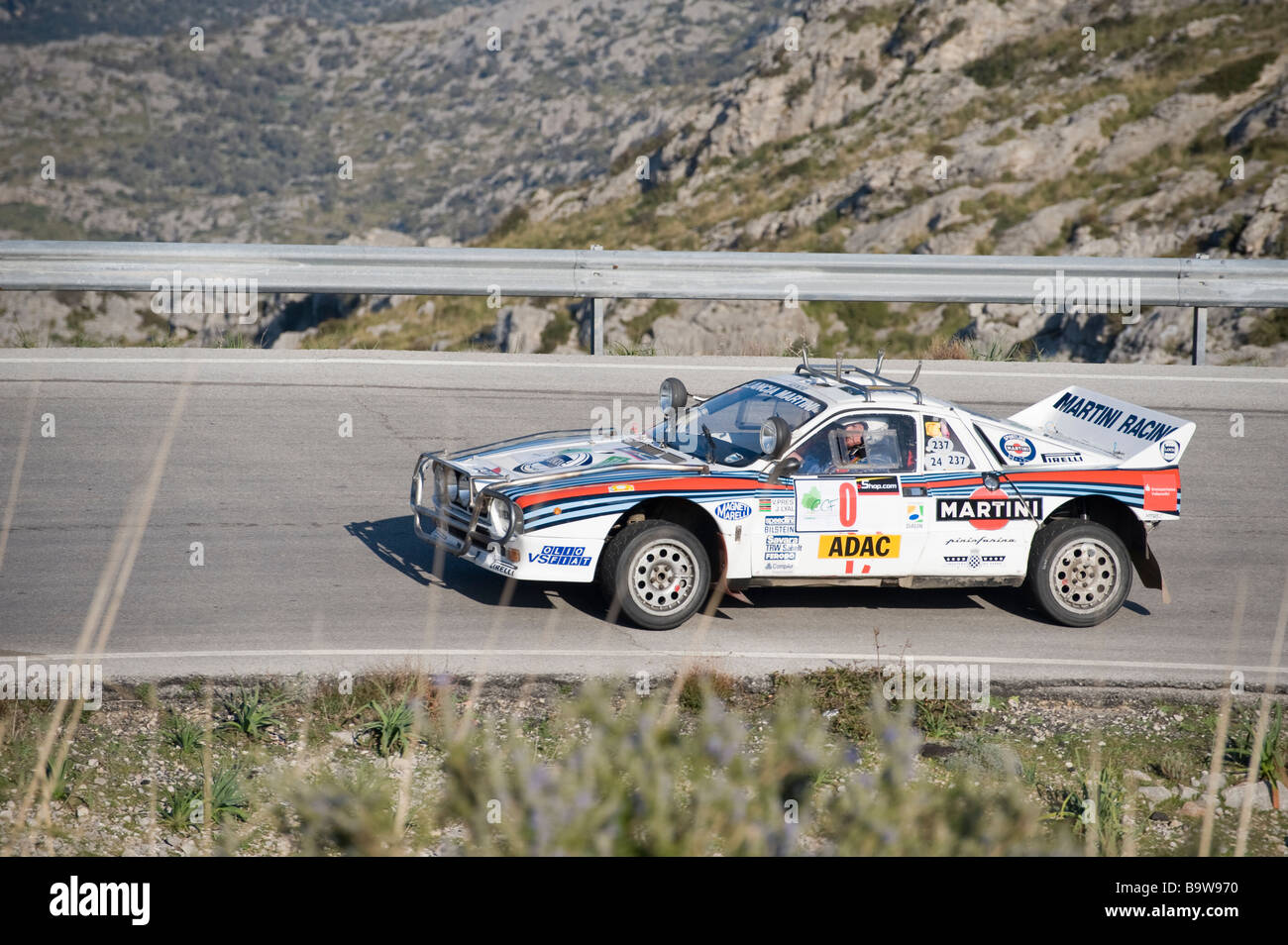 White 1983 Lancia 037 car racing in the classic car rally Mallorca ...