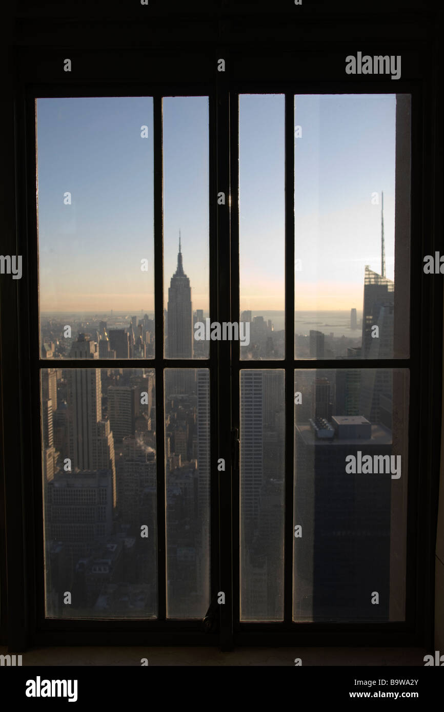 WINDOW FRAMED VIEW OF MIDTOWN SKYLINE MANHATTAN NEW YORK CITY USA Stock ...