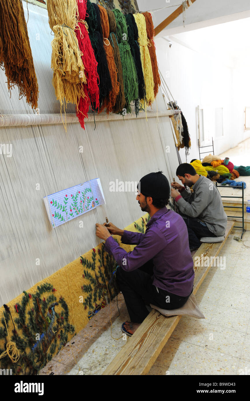 Egypt near saqqara or saqqarah Workers at a carpet making factory Stock ...