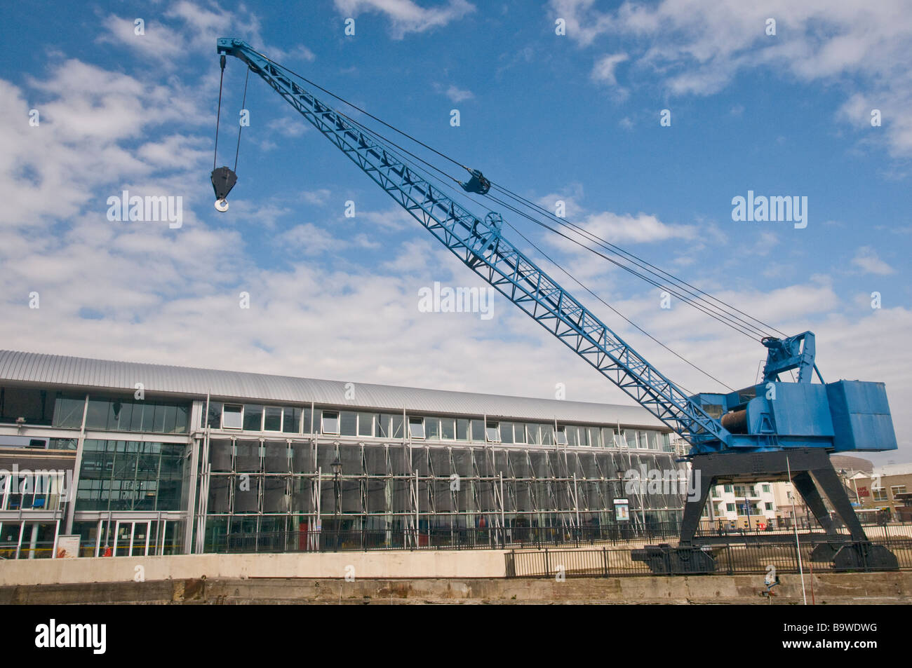 The Techniquest Science Museum framed by Old Docks Crane Cardiff Bay ...