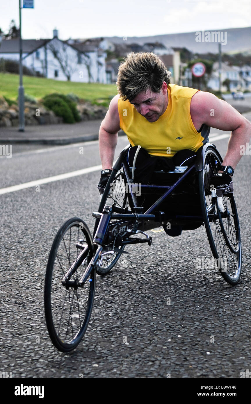 Wheelchair athlete Paul Hannon competing in the Larne Half Marathon ...