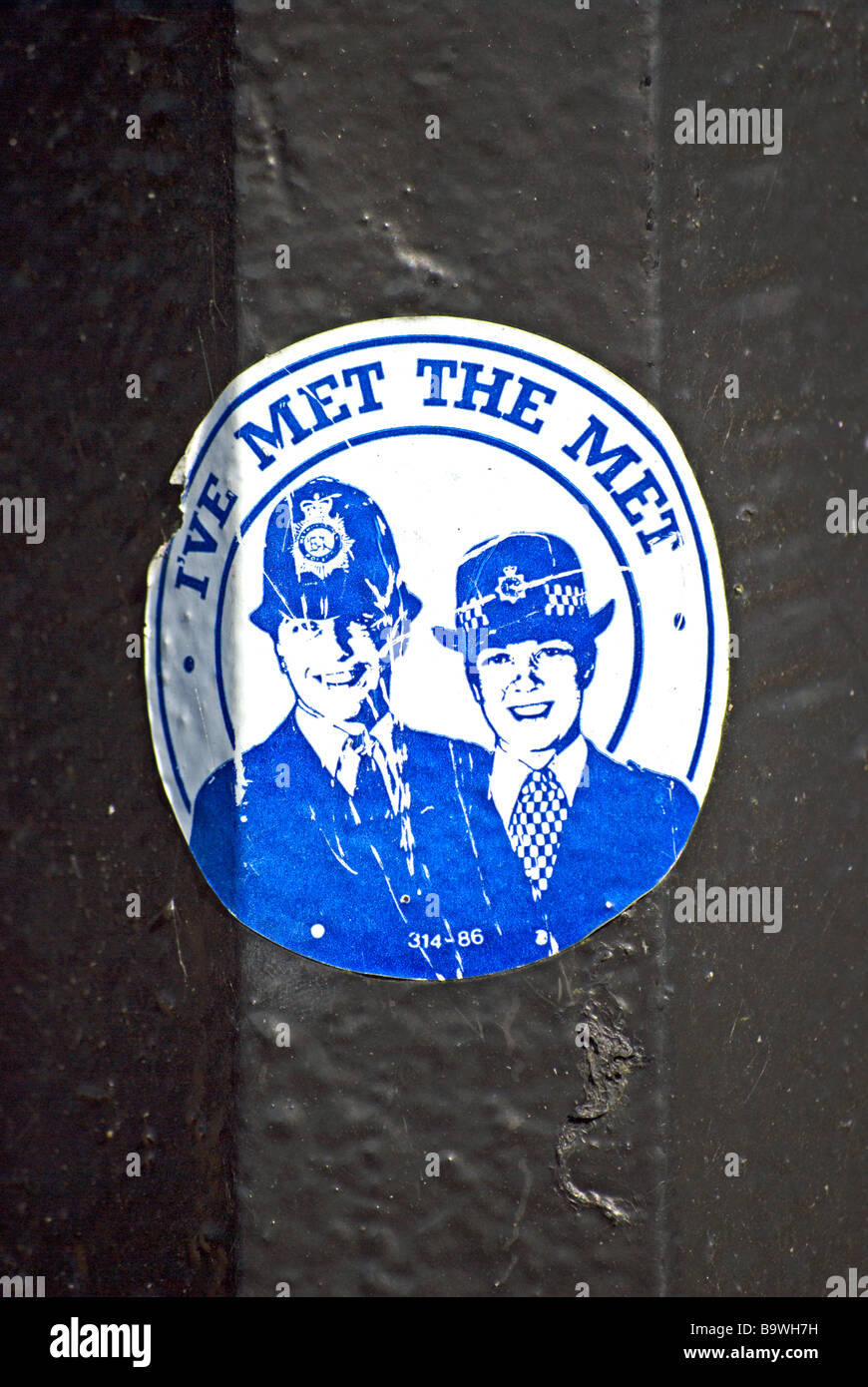 i've met the met sticker on a lampost, with smiling policeman and ...