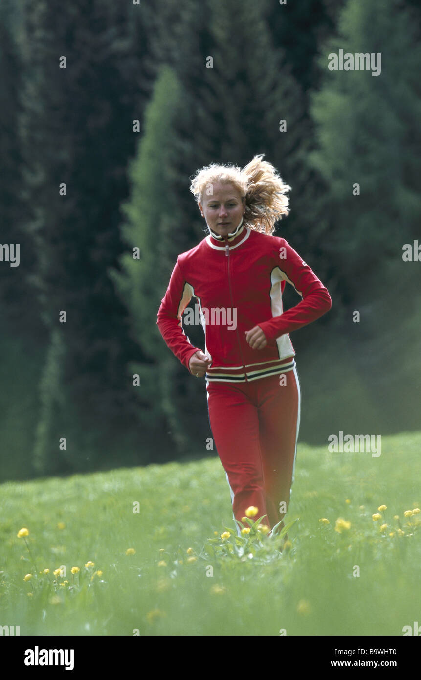 Red jogging suit hi-res stock photography and images - Alamy