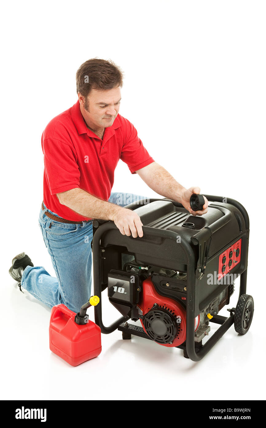 Man checking the fluid levels on his gas powered electricity generator ...