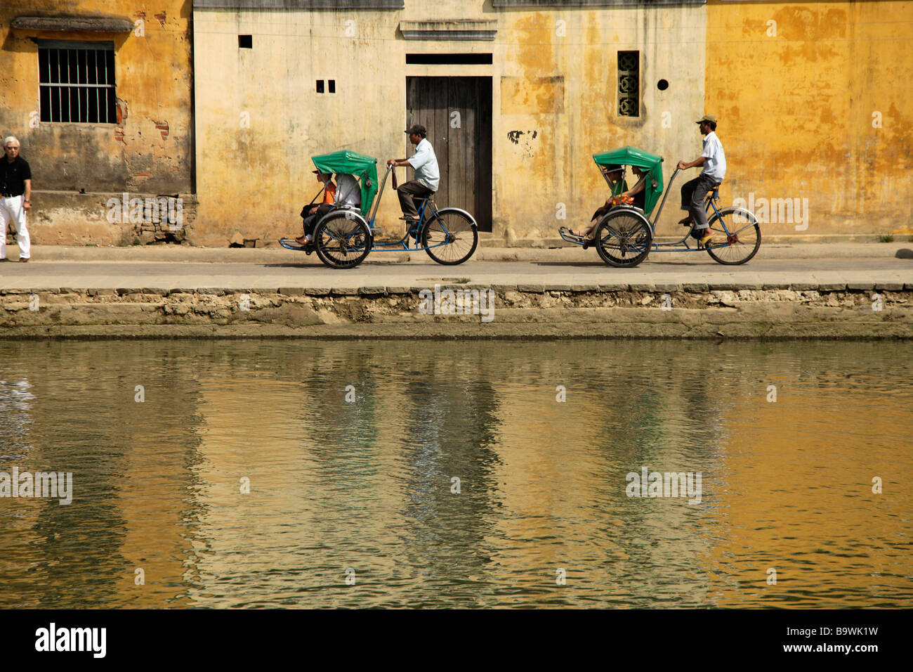 Cyclo Driver at the Thu Bon River in Hoi An Vietnam Stock Photo - Alamy