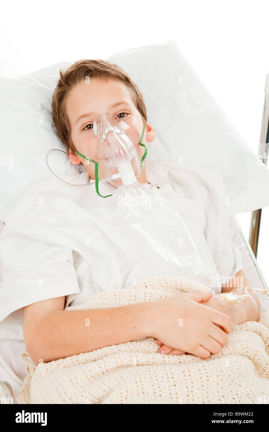 Sick little boy in the hospital breathing with an oxygen mask Stock ...