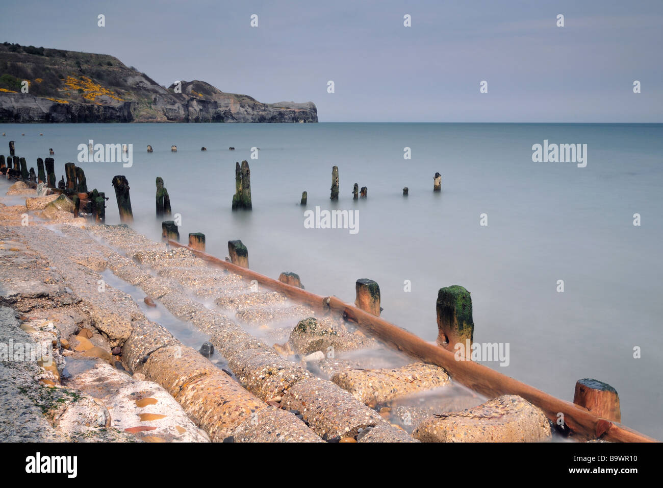 Eroded groynes on the beach at Sandsend near Whitby, Yorkshire, UK ...
