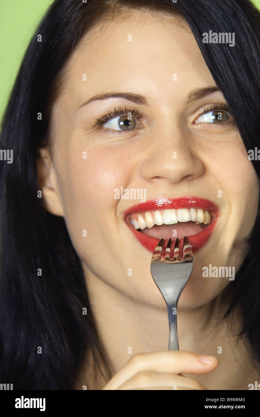 Pretty woman fork mouth hi-res stock photography and images - Alamy