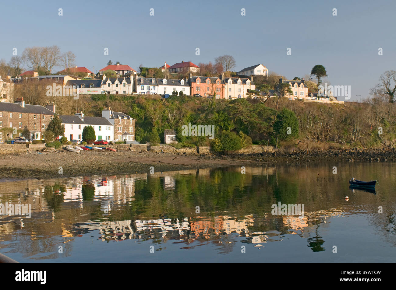 Portree town houses overlook the harbour and the sound of Raasay Isle ...